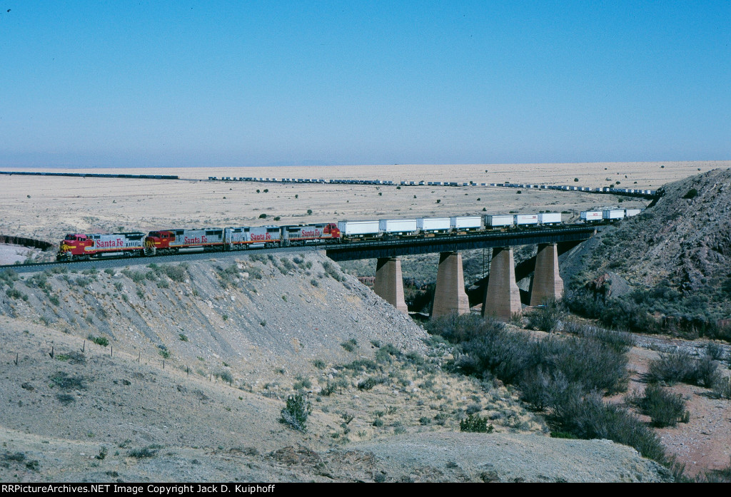 ATSF 562 leads three other Warbonnets e/b on bridge #1 threw Abo Canyon,